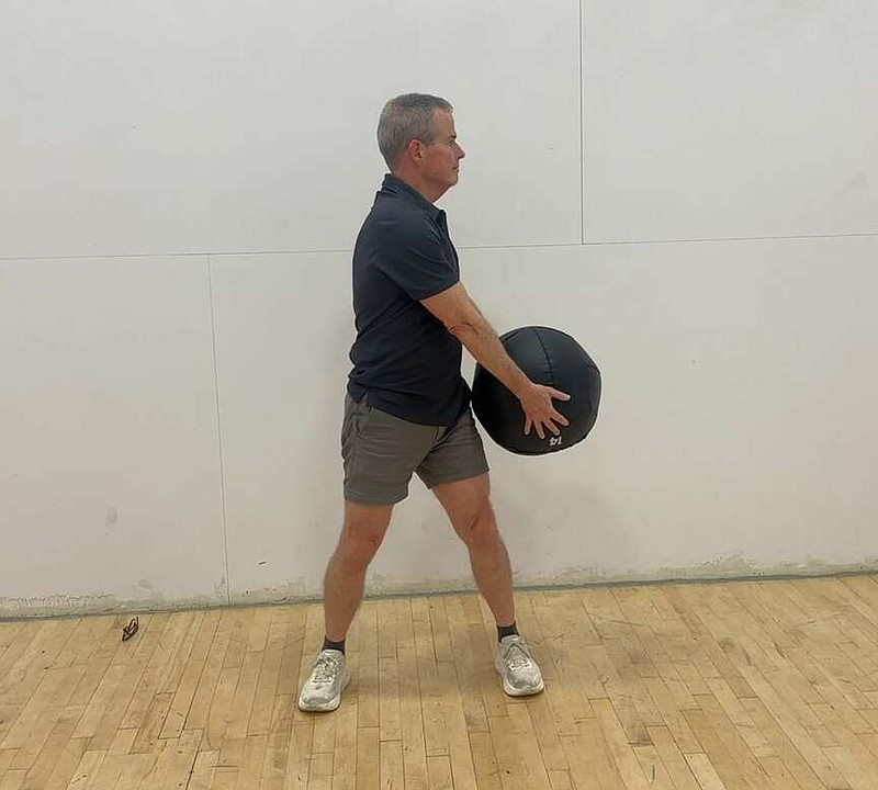 In this third of three photos, Jay Lloyd, personal trainer with the ...