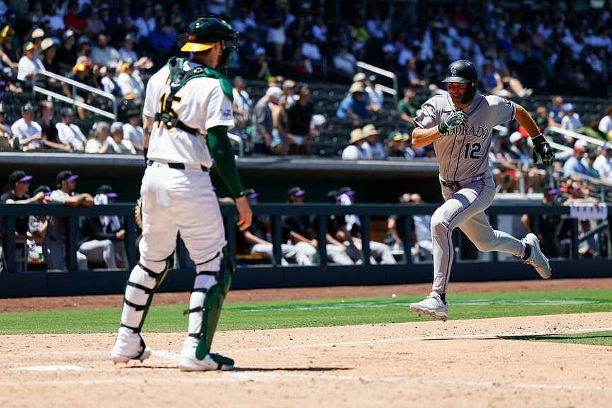 MLB Roundup: Rockies hit the jackpot, set runs record vs. Athletics in ...
