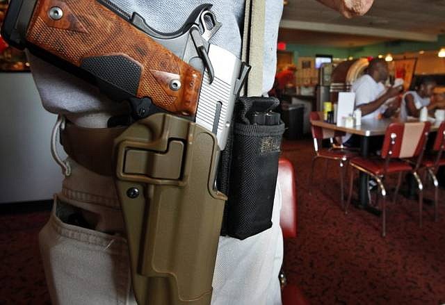 Gov: State law allows open carry of guns