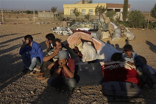 Islamic State fighters shell Syrian Kurdish town | Chattanooga Times ...