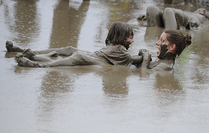 Rain + mud = messy good time for hundreds of kids | Chattanooga Times ...