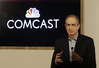 Comcast 4th-quarter net income nearly flat | Chattanooga Times Free Press