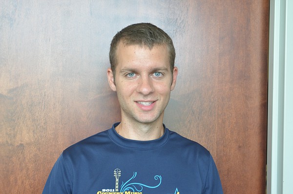 New coach Caleb Morgan has Lee University runners making strides ...