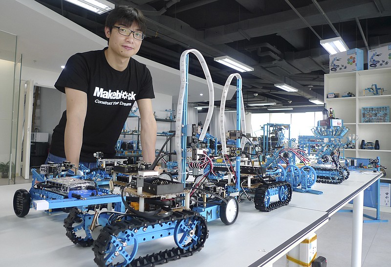 China's high-tech future emerges in factory town S | Chattanooga Times ...