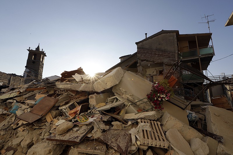 The Latest: Italy probes building codes after deadly quake ...