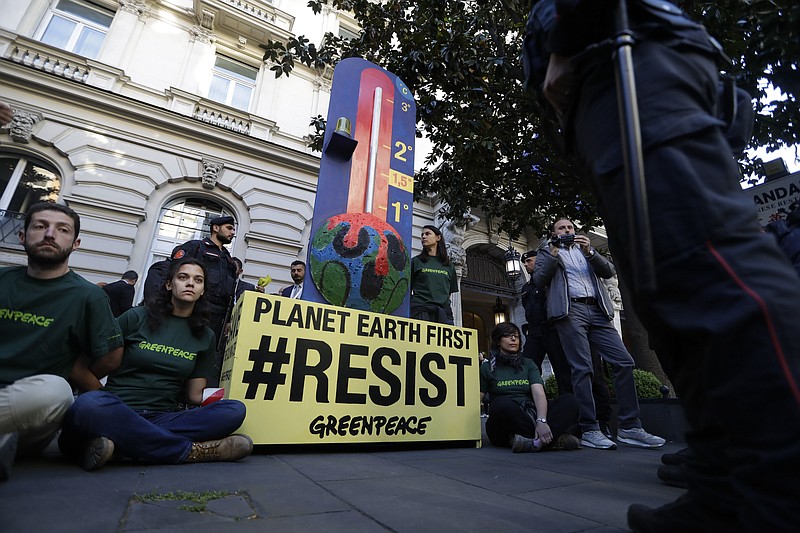 Greenpeace protests outside G-7 Energy meeting | Chattanooga Times Free ...