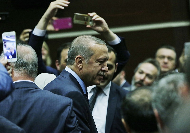Turkey's president rejoins ruling party after referendum win ...