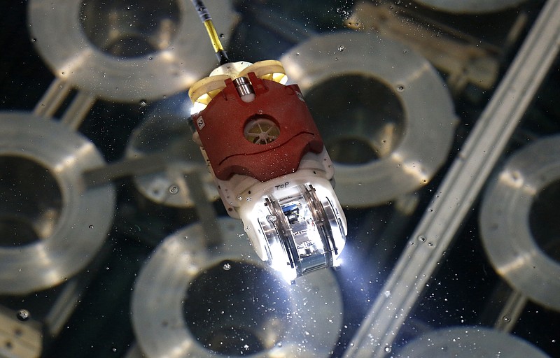 Swimming robot to probe damage at Japan nuclear plant | Chattanooga ...