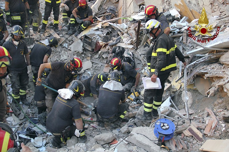 8th body pulled from the rubble in Italy building collapse ...