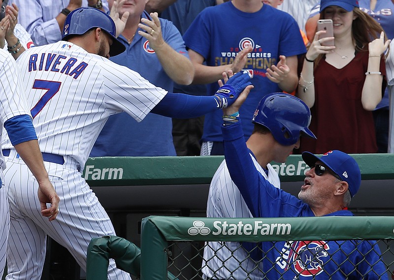 Rene Rivera hits grand slam as streaking Cubs top Braves 14-12 ...