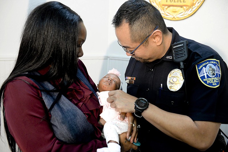 Bodycam shows officer saving life of newborn baby | Chattanooga Times ...