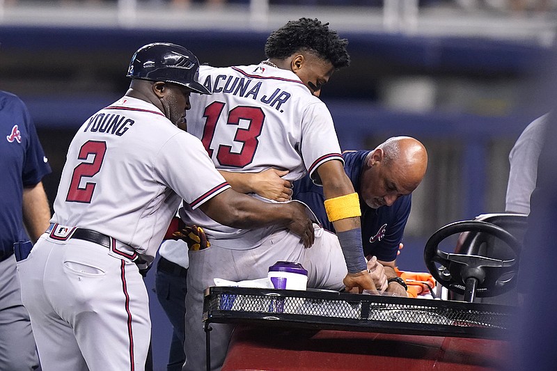 Braves star Ronald Acuña Jr. carted off field with knee injury in win ...