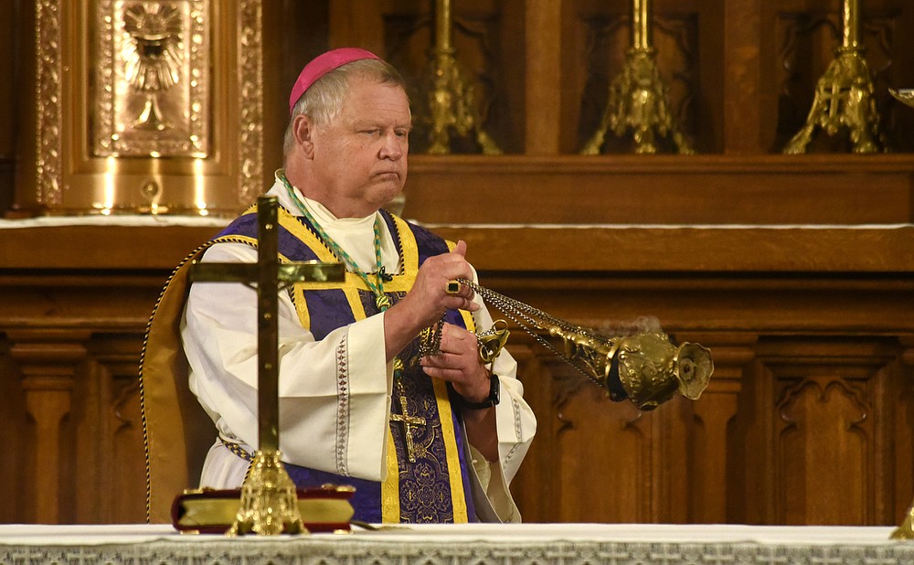 The Rev. Patrick Ryan's remains moved to Catholic church as process for ...