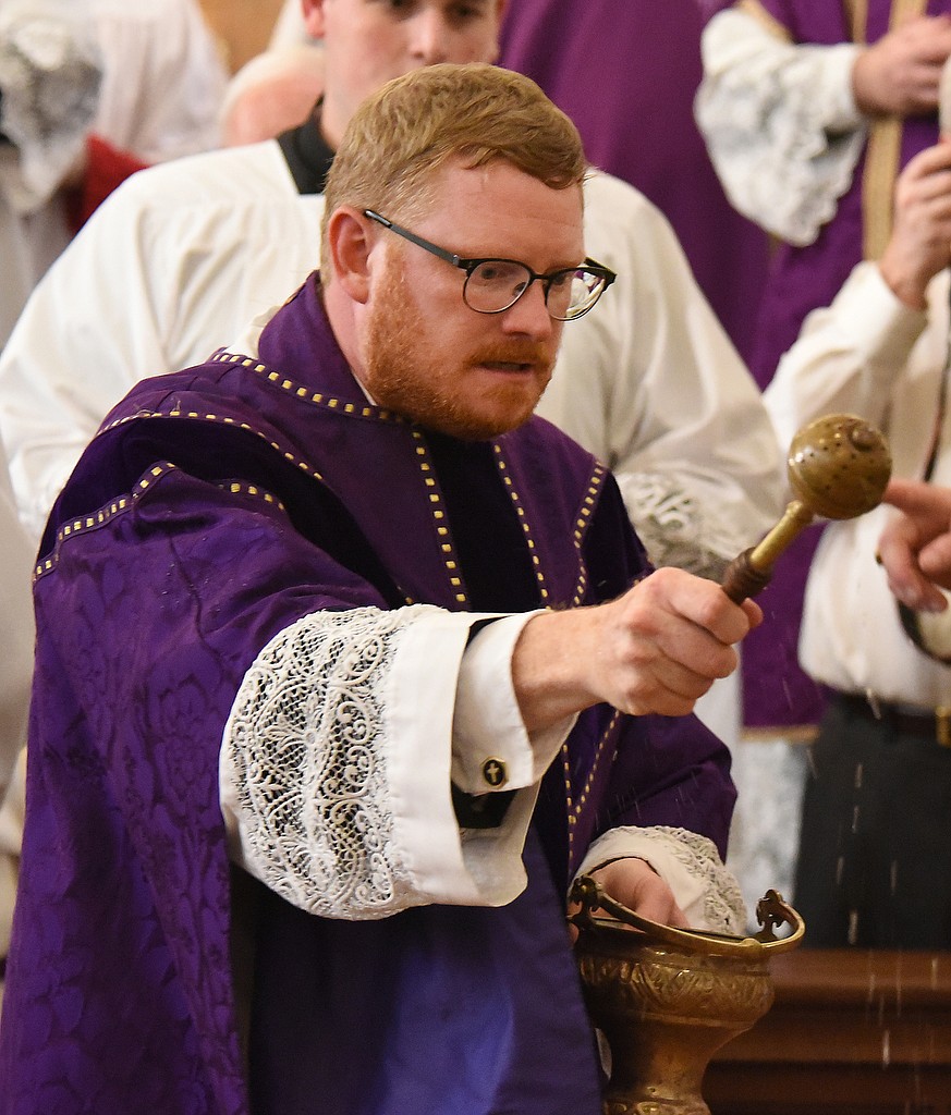 The Rev. Patrick Ryan's remains moved to Catholic church as process for ...