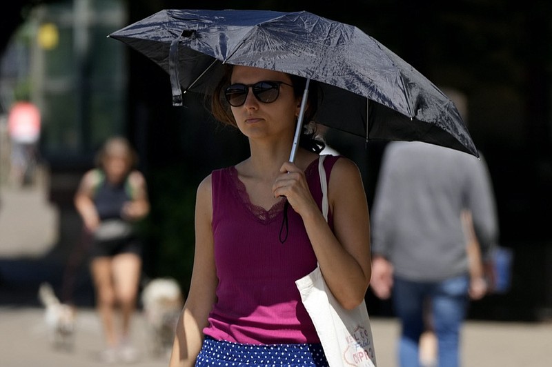 UK issues first-ever 'red' warning for hot weather next week ...